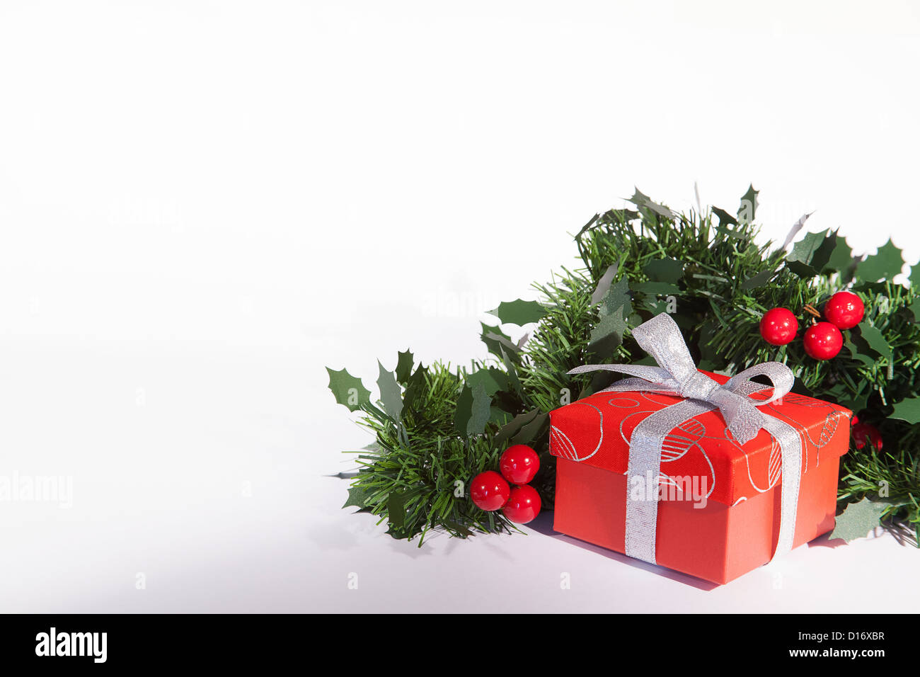 a Christmas present on white background Stock Photo - Alamy