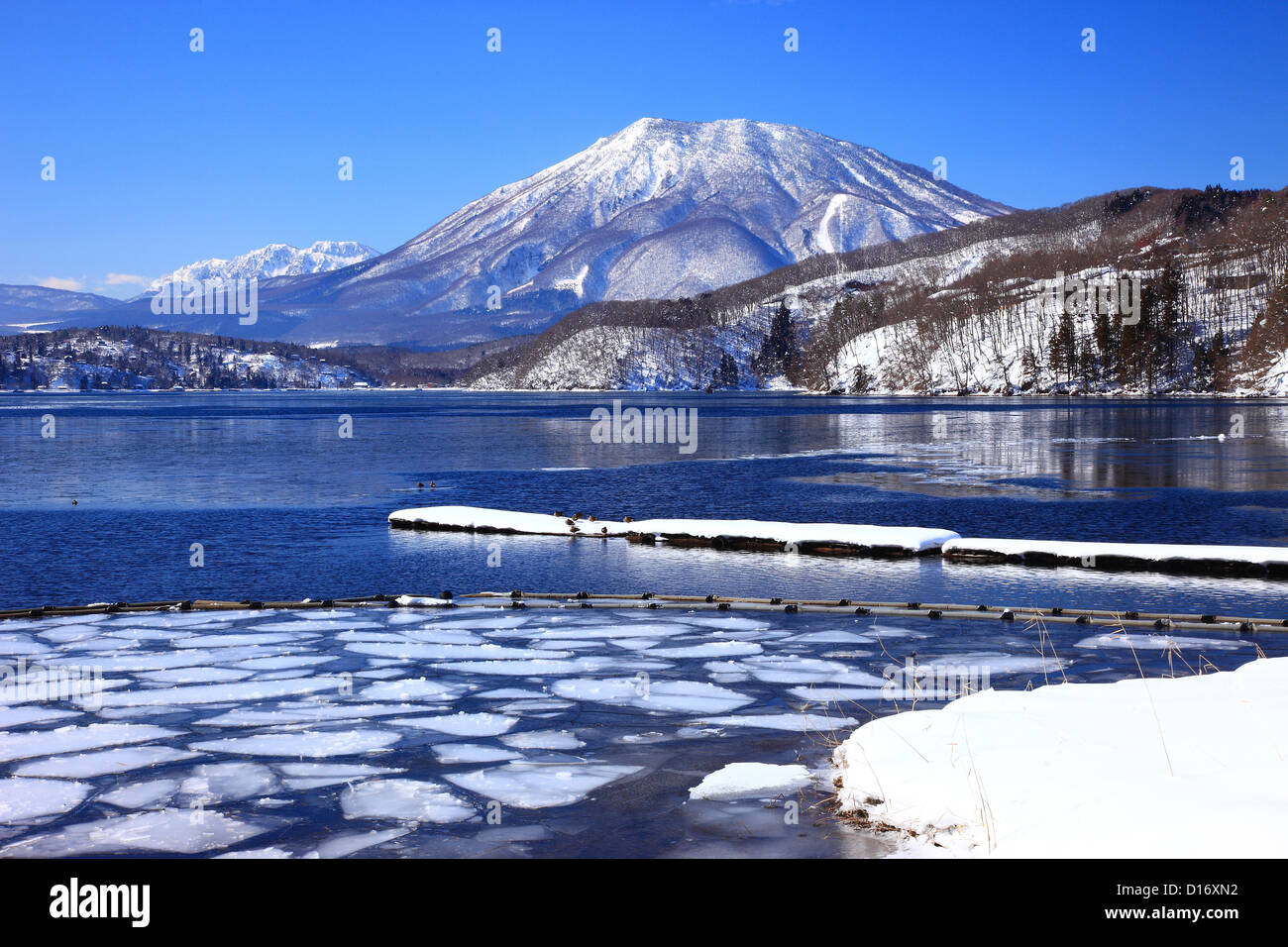 Mountains covered in snow and Nojiri lake in Shinanomachi, Nagano ...