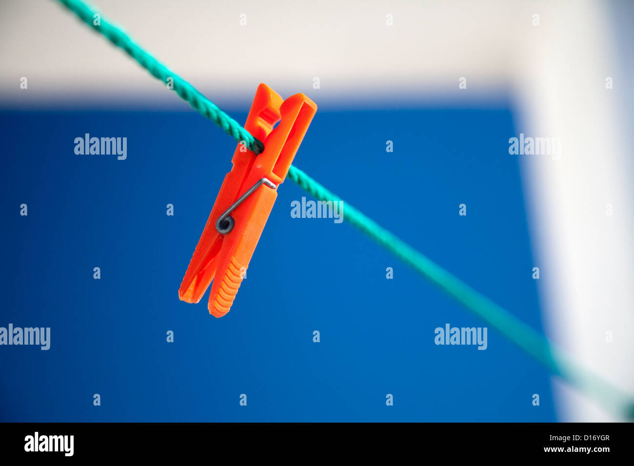 Seville, Spain, single clothespin on clothes line Stock Photo - Alamy