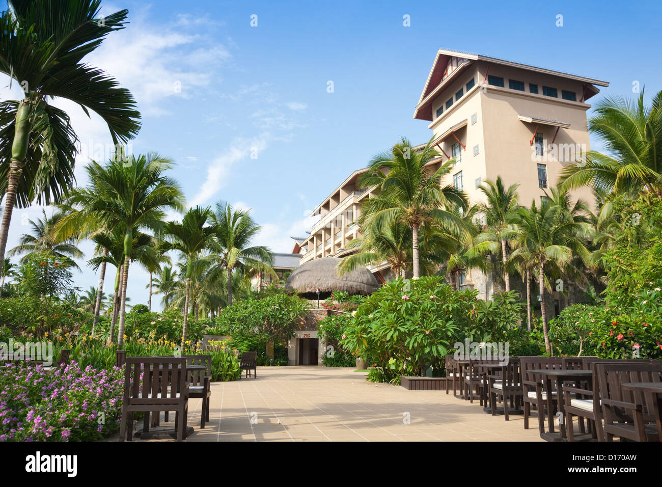 Outdoor cafe in hotel garden Stock Photo - Alamy