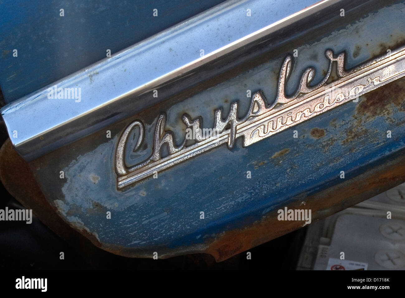 A tarnished Chrysler badge on a classic car Stock Photo - Alamy