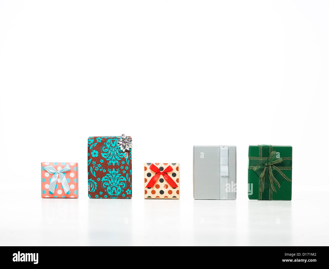 closeup of different colorful gift boxes in a row with beautiful and ...