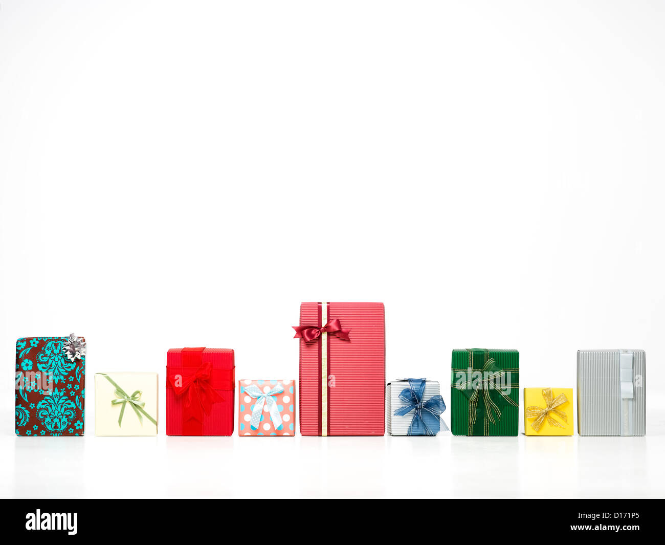 closeup of different colorful gift boxes in a row with beautiful ...
