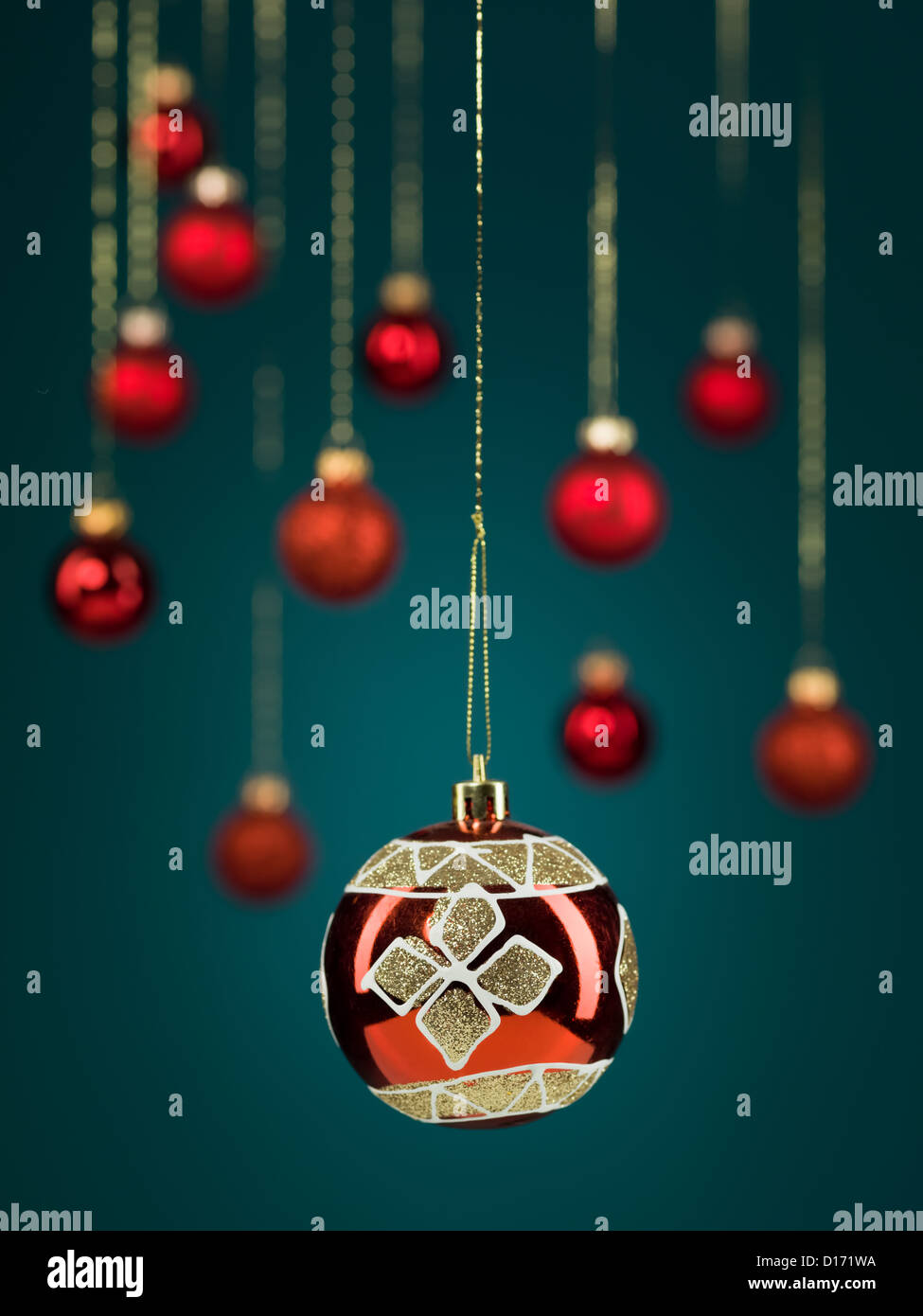 closeup of hanging christmas red globe with glittery decorations, with ...