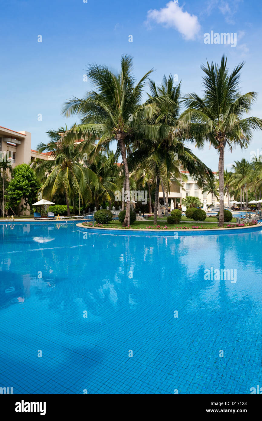 Open air swimming pool in the tropical garden Stock Photo - Alamy