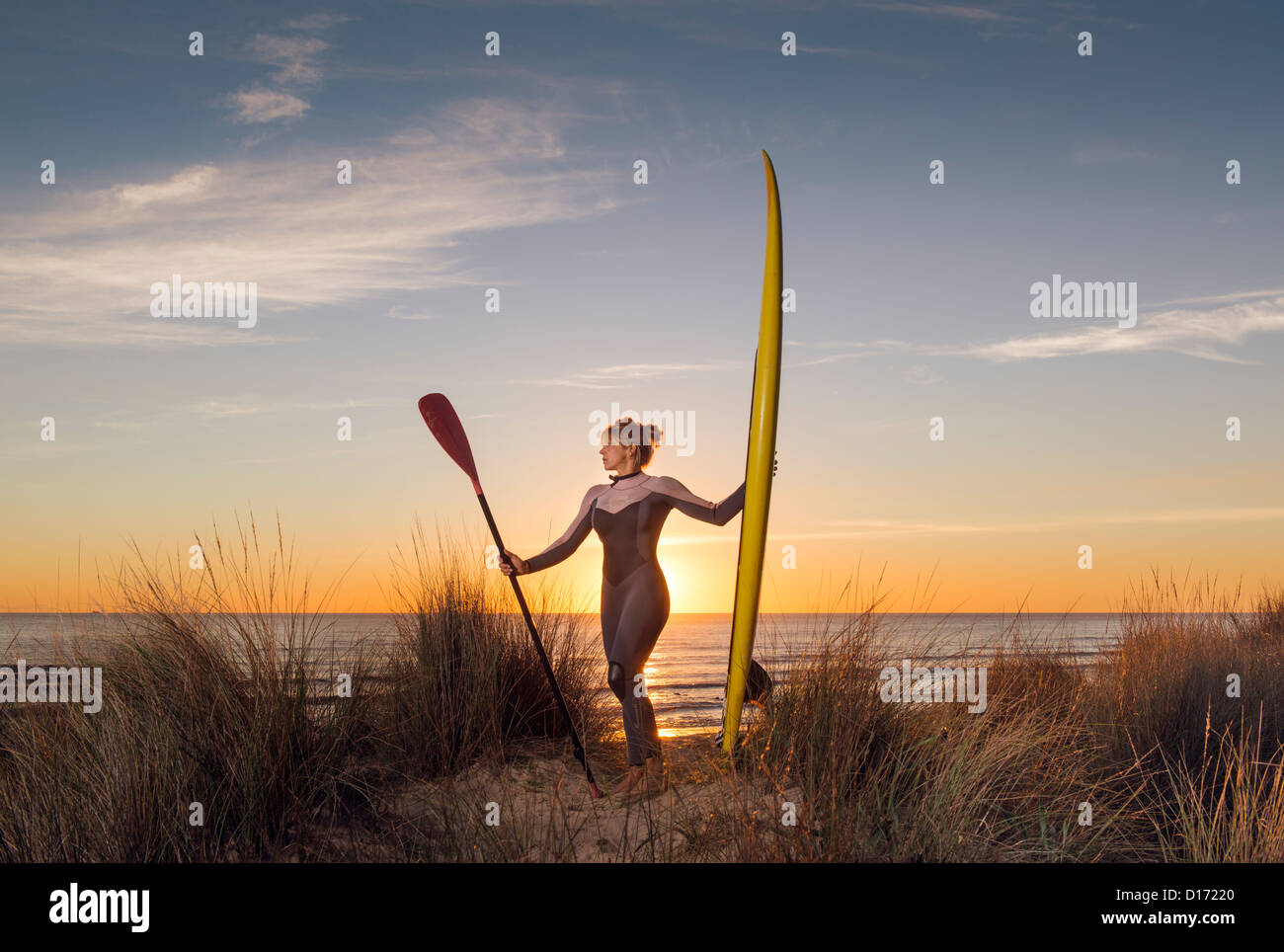 Woman with a stand up paddle surf board. Tarifa, Costa de la Luz, Cadiz ...