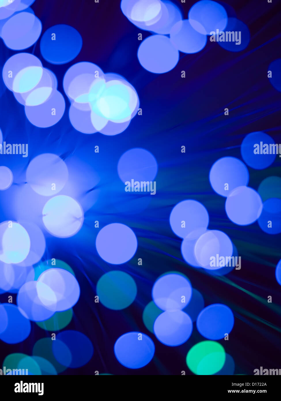 conceptual macro wallpaper with fiber optics light wand with blue round ...