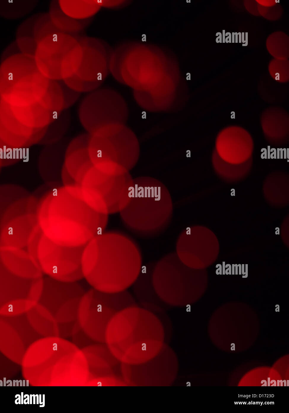 wallpaper patterned with round shaped red lights on black background ...