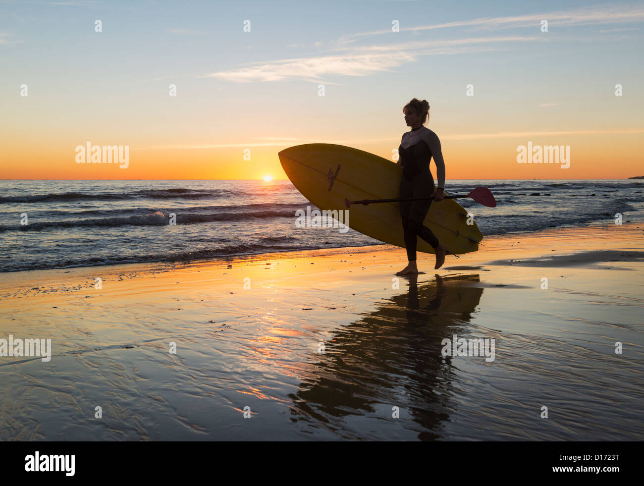 Person with stand up paddle surf board. Tarifa, Costa de la Luz, Cadiz ...