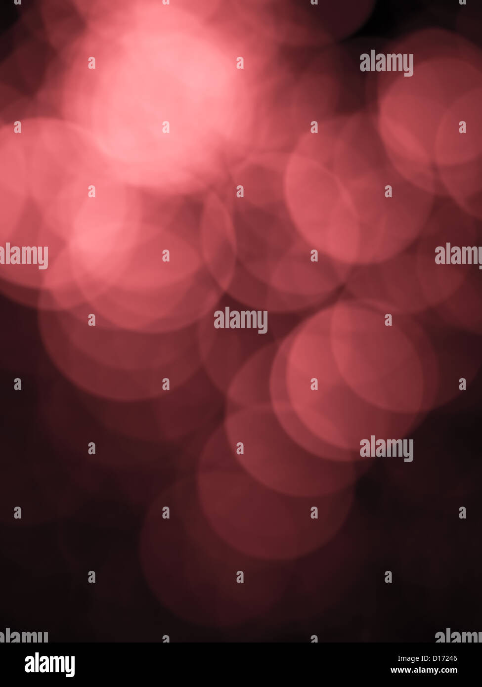 abstract wallpaper with faded red colored lights merging into an ...