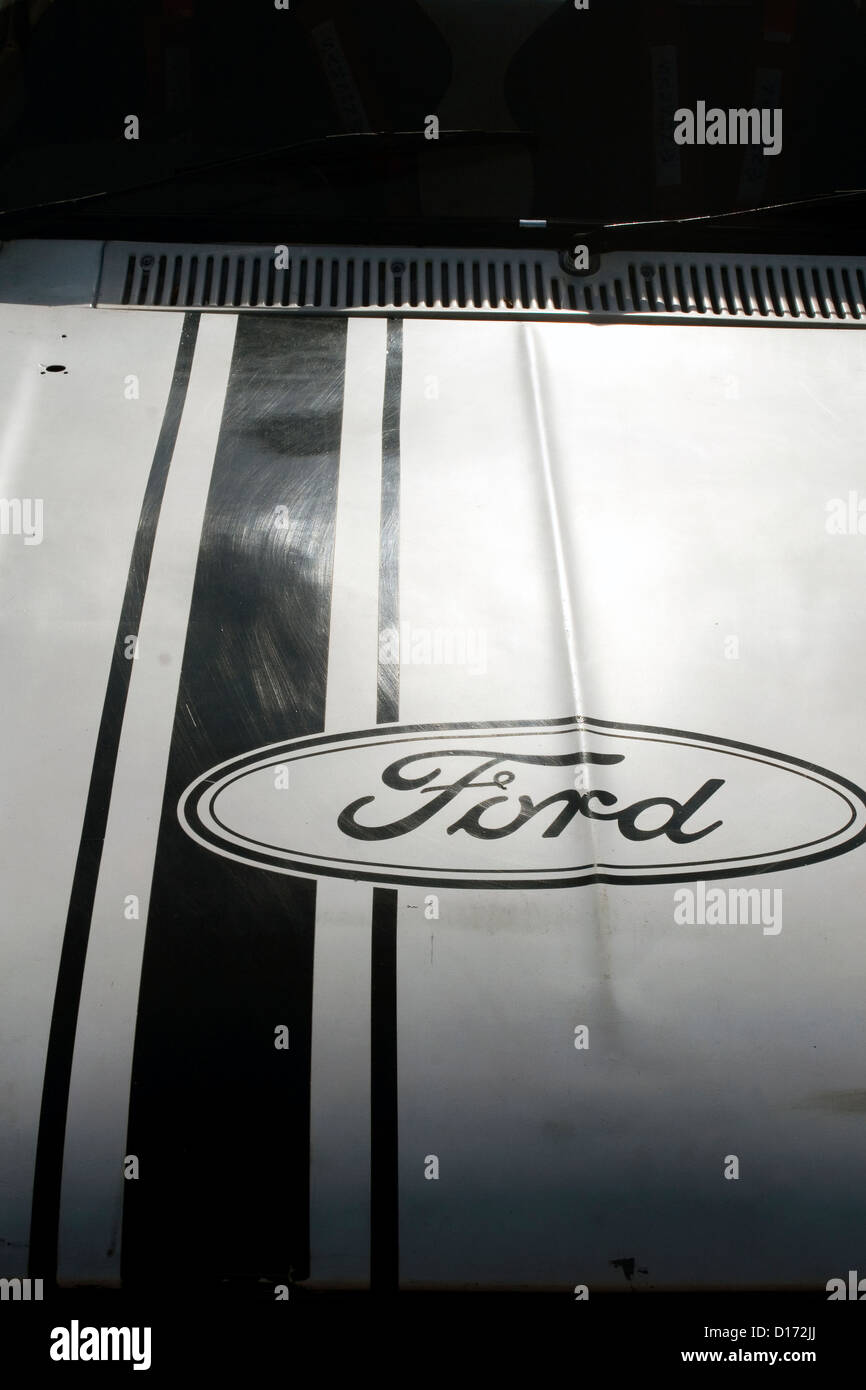 The Ford badge on the bonnet of a classic Ford Escort car Stock Photo ...