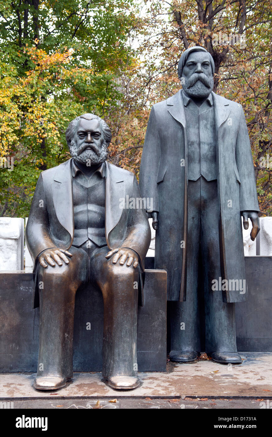 The statues of Karl Marx (sitting) and Friedrich Engels (standing ...