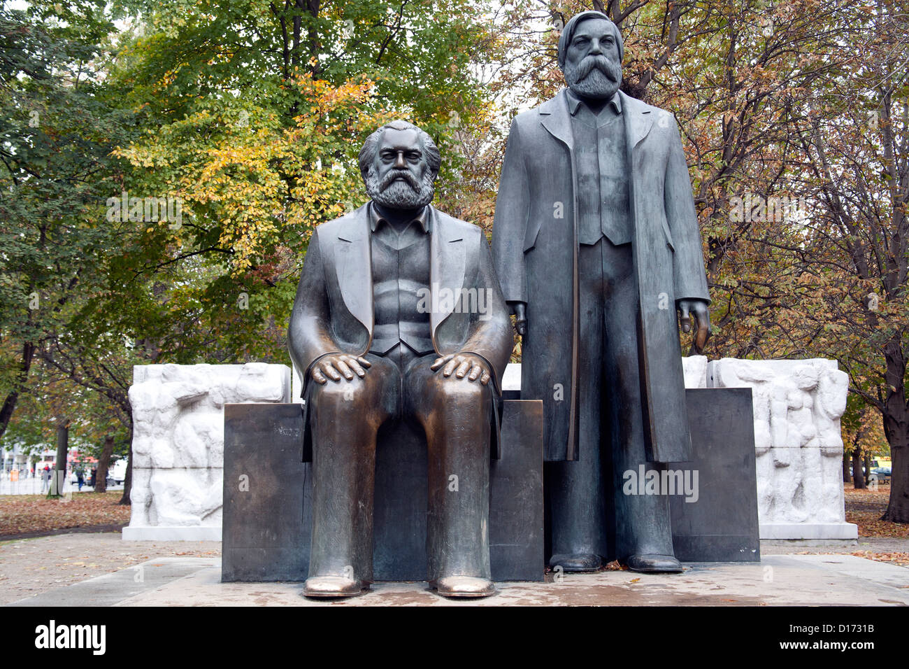 The statues of Karl Marx (sitting) and Friedrich Engels (standing ...