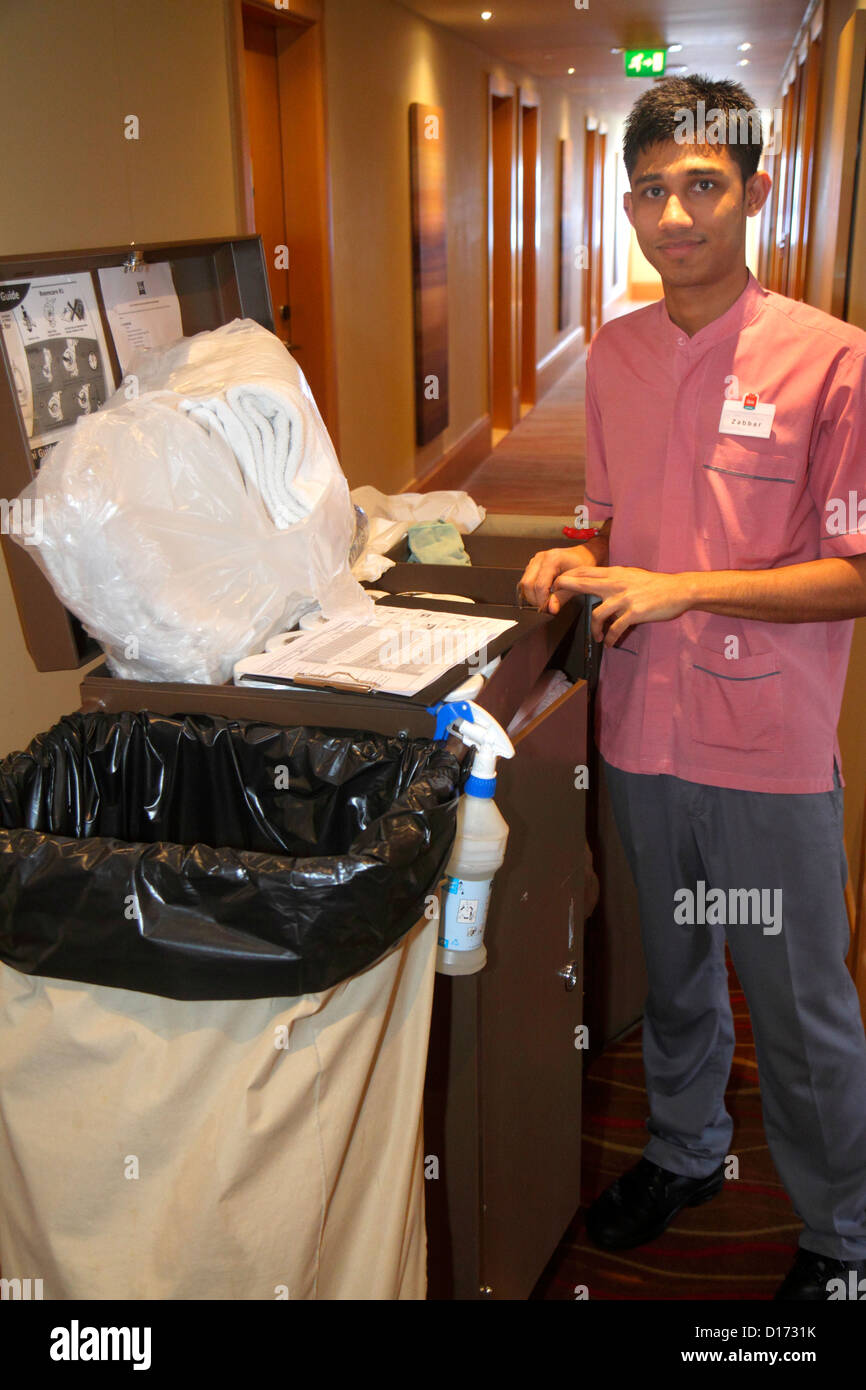 Cleaning migrant workers hi-res stock photography and images - Alamy