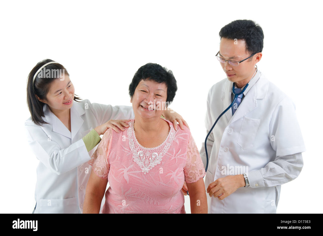 asian senior female medical checkup with doctors ,south east asian ...