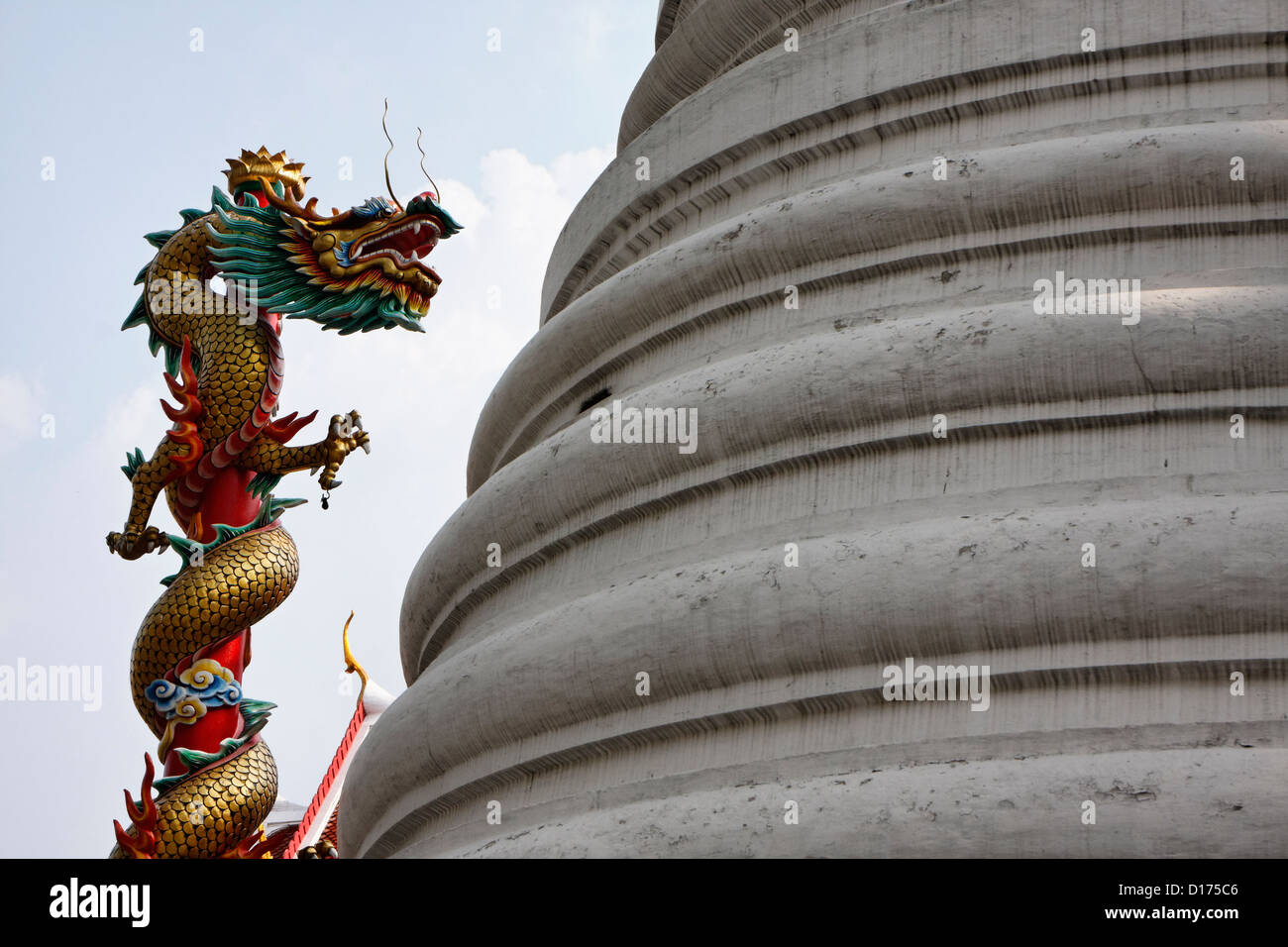 Thailand, Bangkok, a religious dragon statue close to a buddhist temple ...