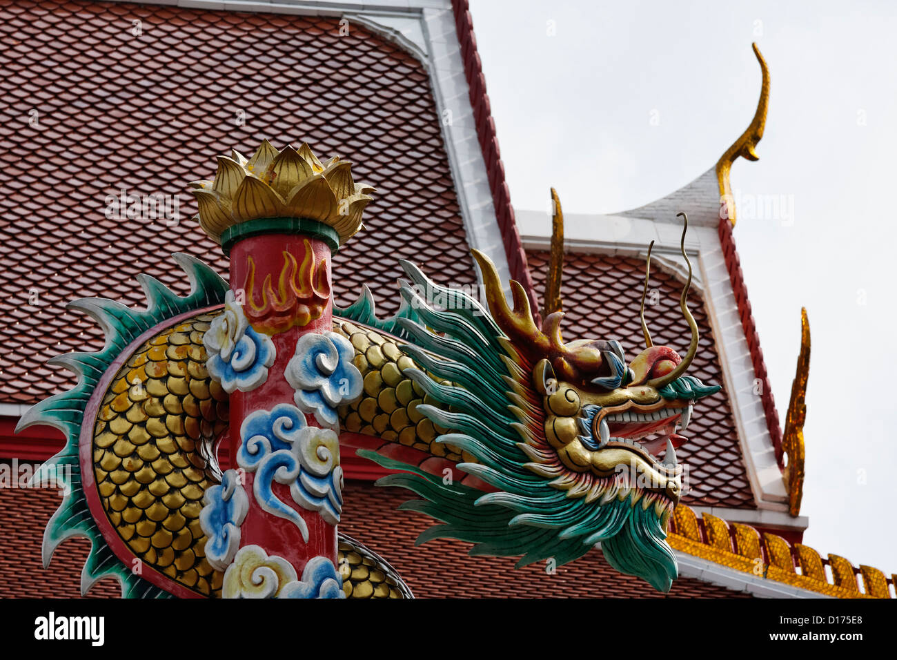 Thailand, Bangkok, a religious dragon statue close to a buddhist temple ...