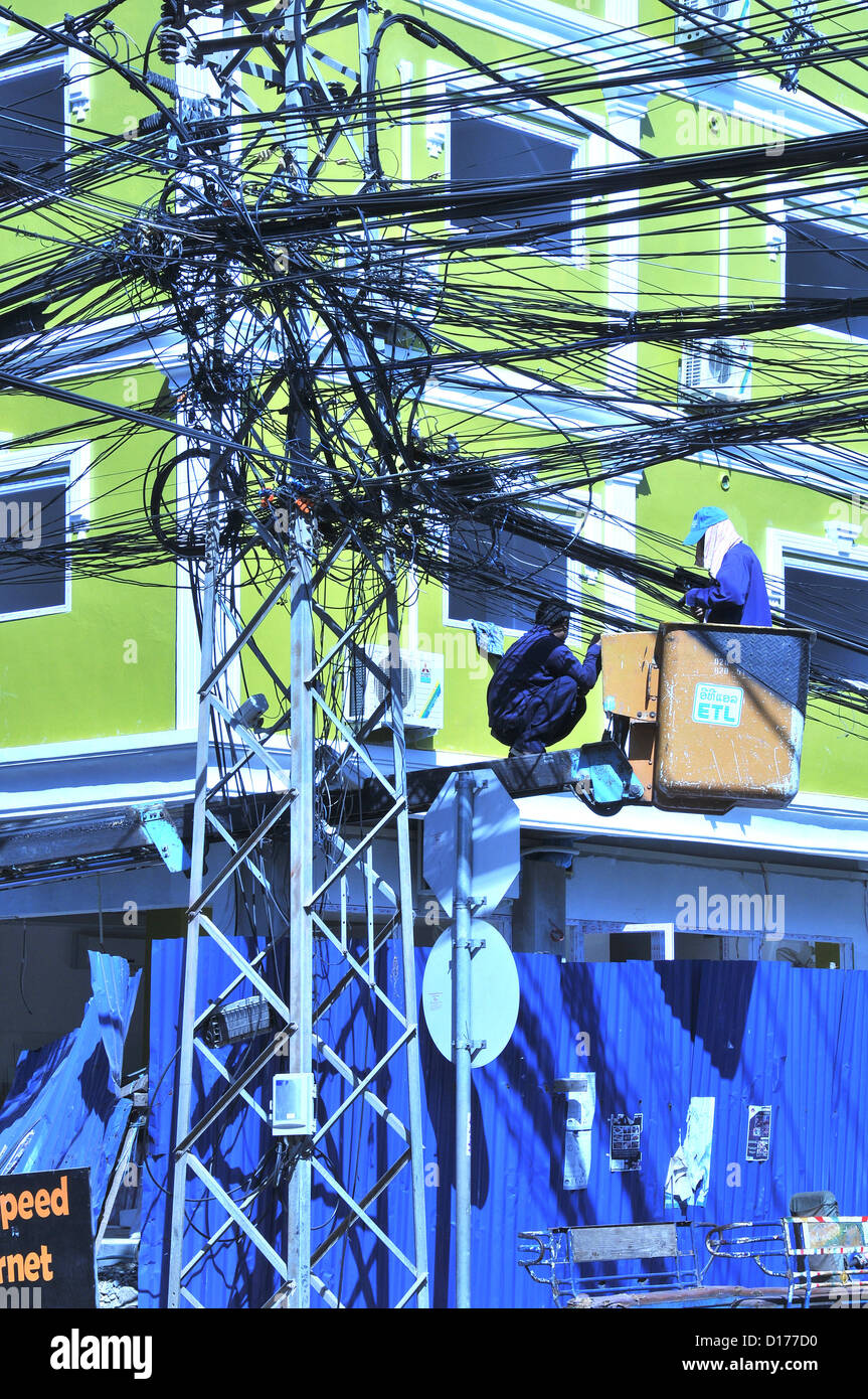 workers on phone lines Vientiane Laos Stock Photo - Alamy