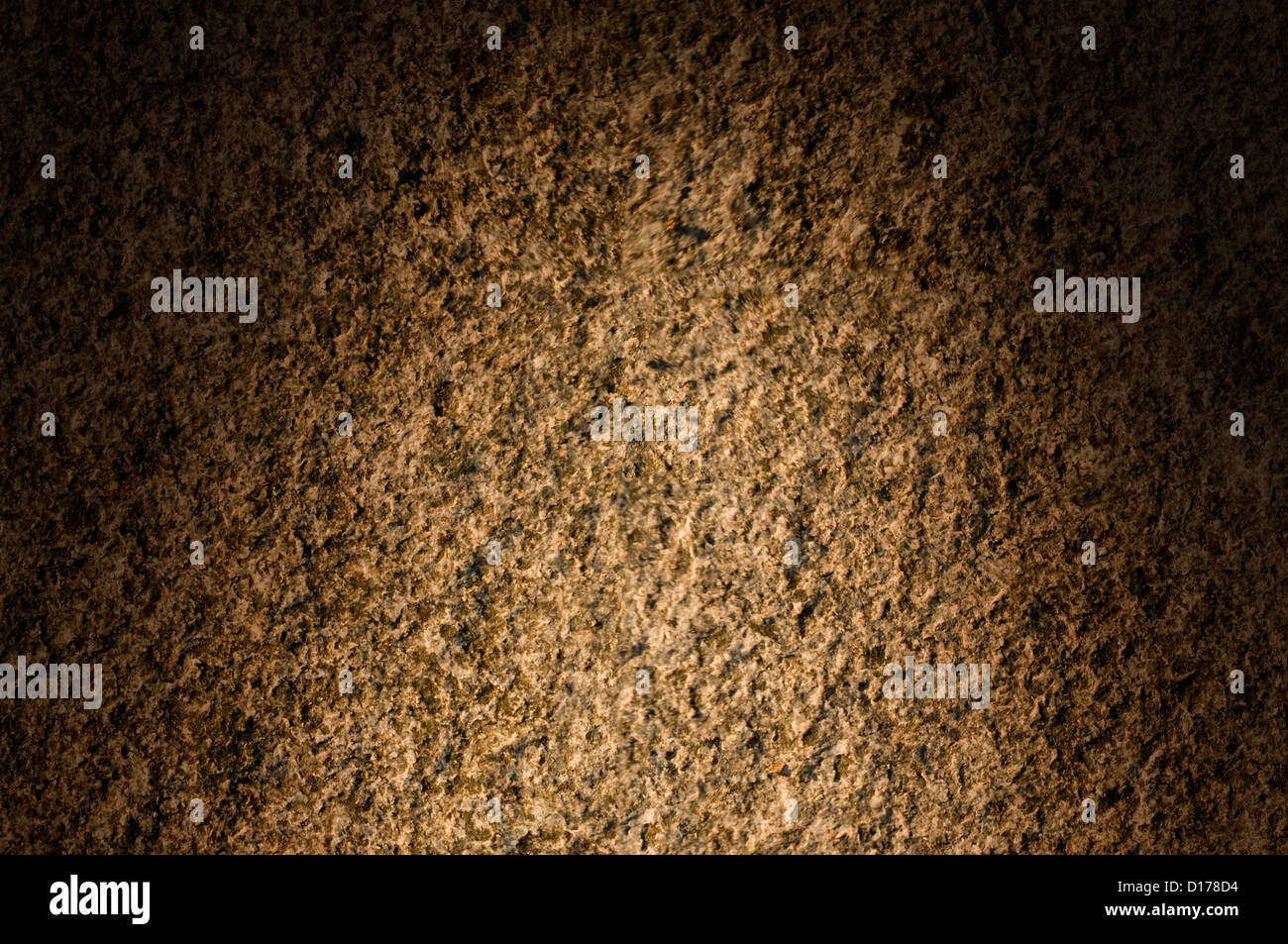 Granite rock stone background texture lit from above Stock Photo - Alamy