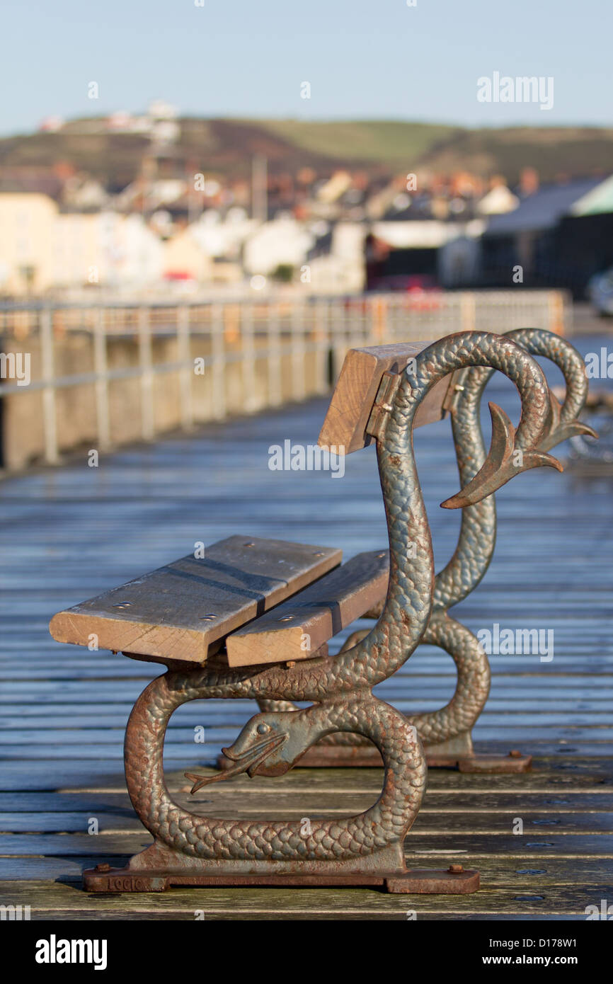 Sea serpent cast iron seaside bench seat at Aberystwyth Stock Photo - Alamy