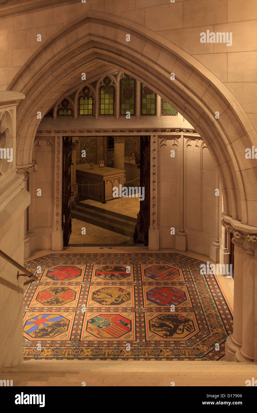 The main entrance to the Royal Crypt in Laeken, Belgium with the coats ...