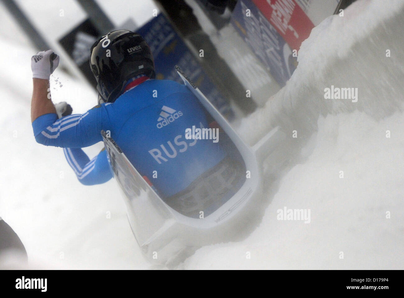Russian Alexandr Zubkov (front) and Dmitry Trunenkov race in the 2012 ...