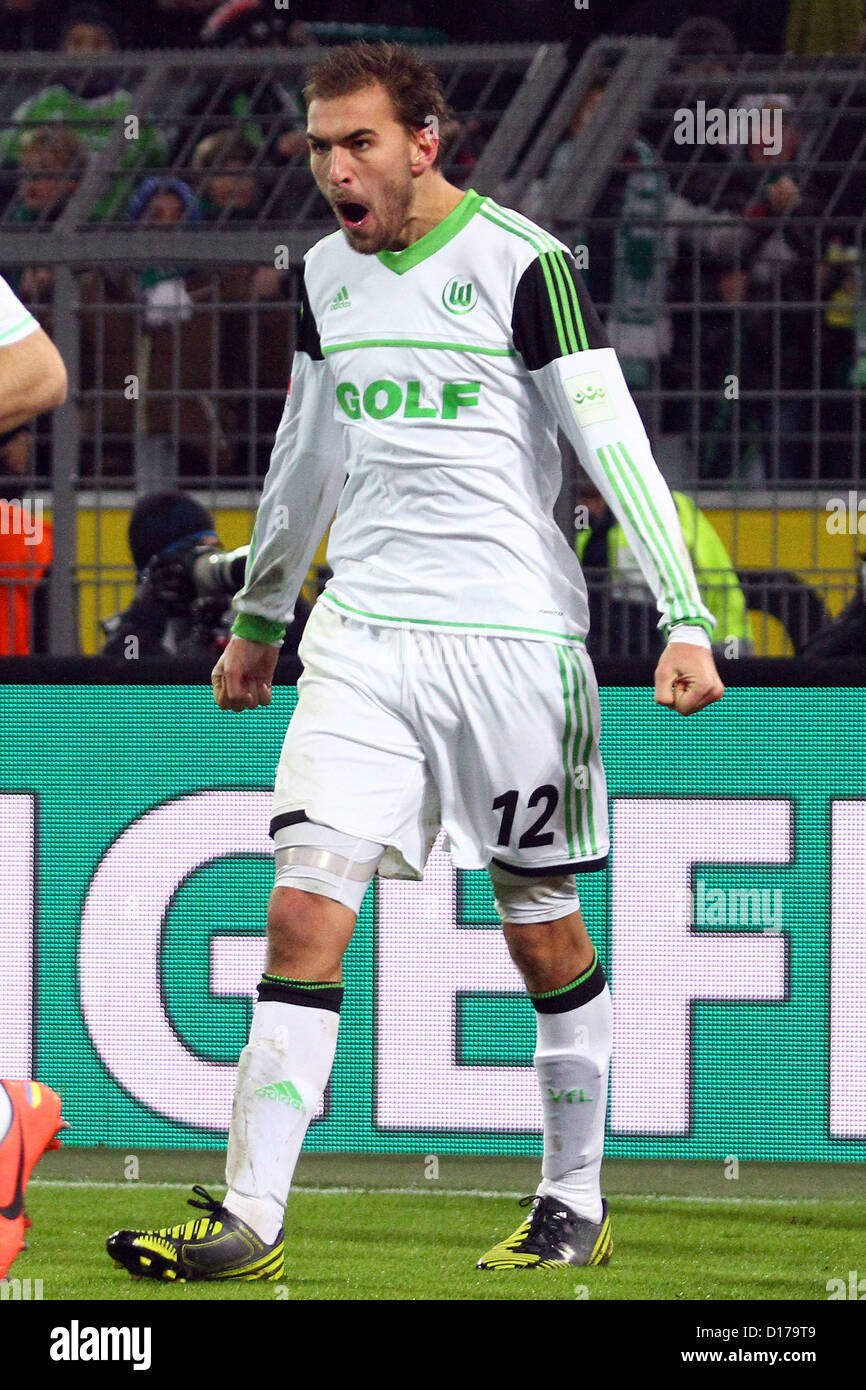 Wolfsburg's Bas Dost celebrates his 2-3 goal during Bundesliga soccer ...