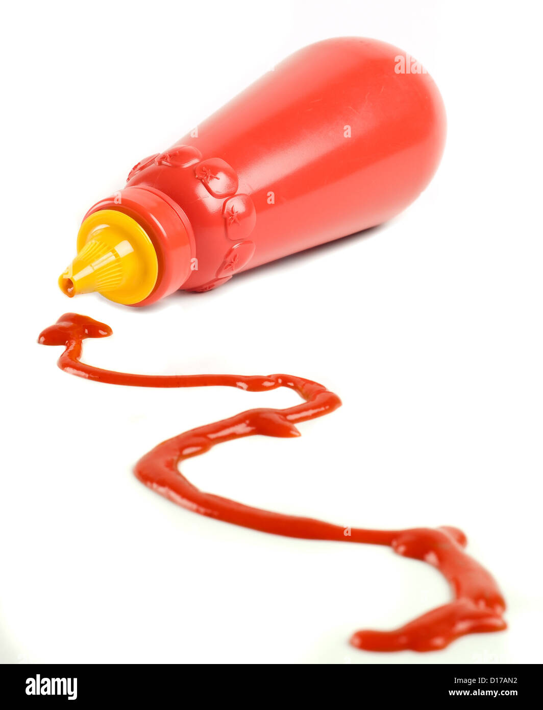 Red tomato ketchup bottle on side with trail of sauce Stock Photo - Alamy