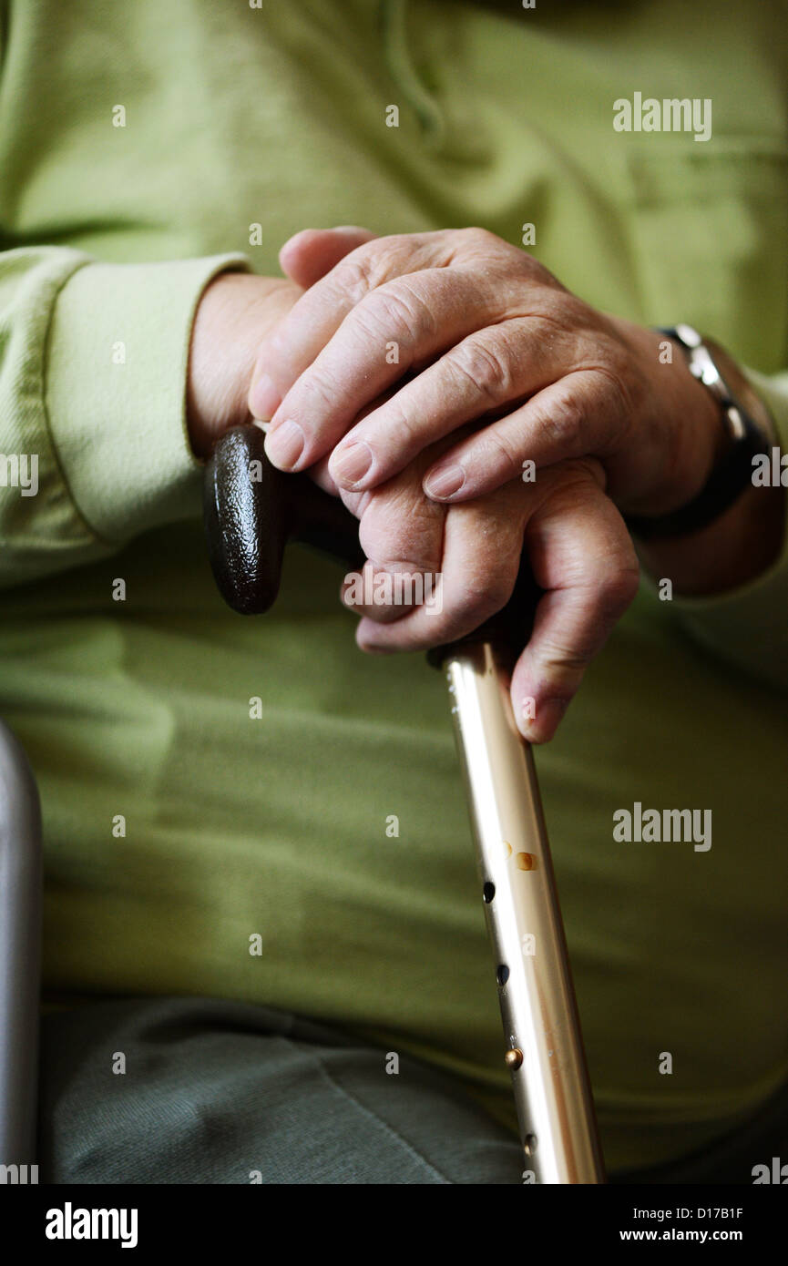 Old man holding a stick hi-res stock photography and images - Alamy
