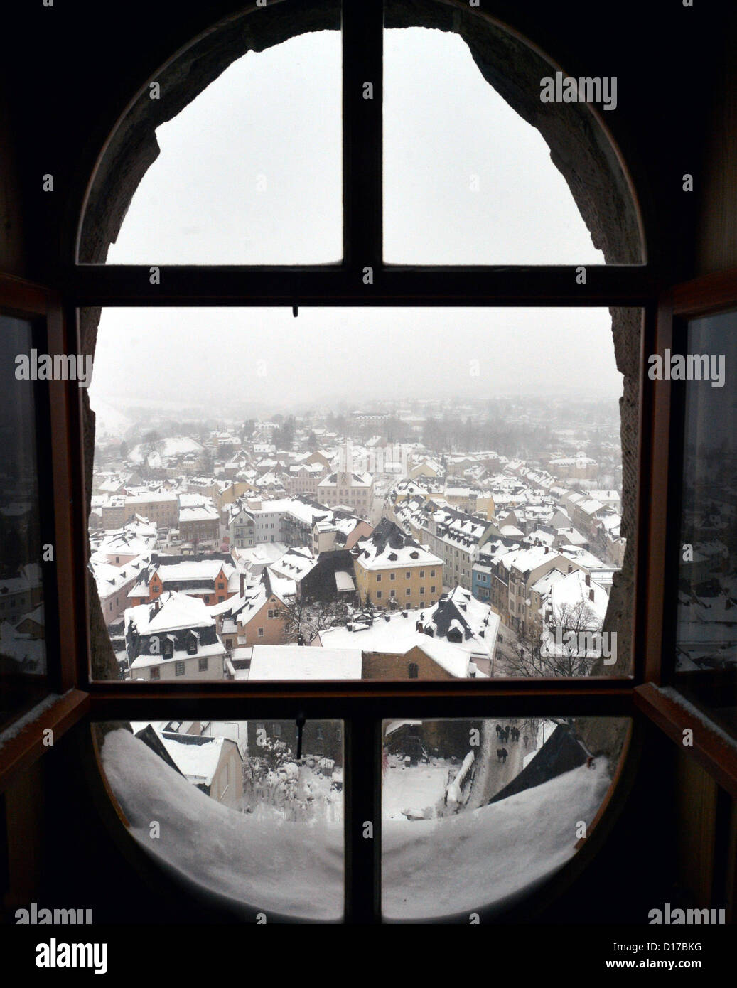 The city of Schneeberg is covered in snow in the Ore mountains, Germany ...
