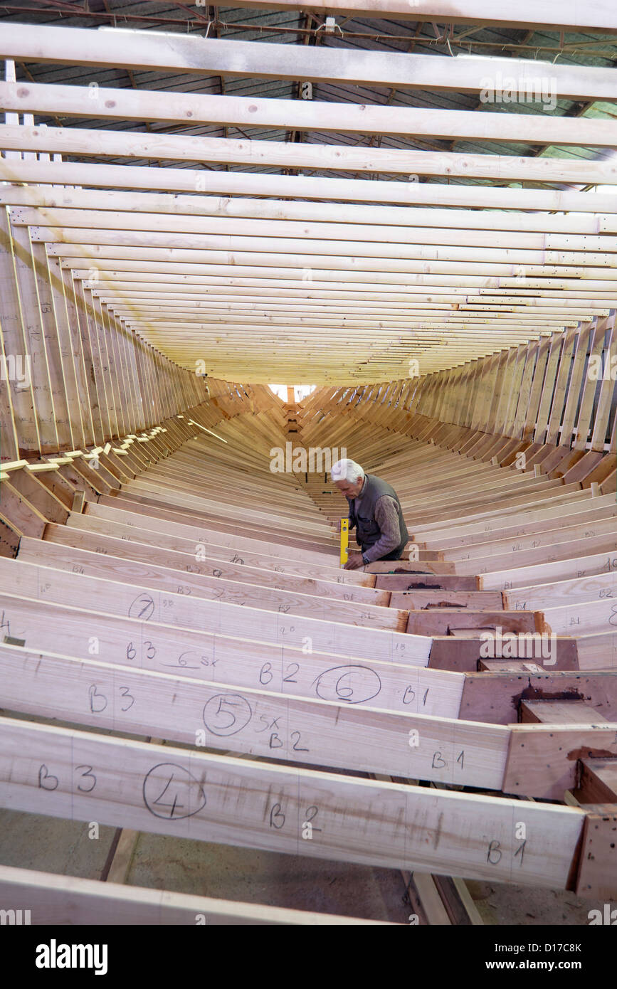 Italy, Fiumicino (Rome), the wooden keel beams of a 35 meters luxury ...