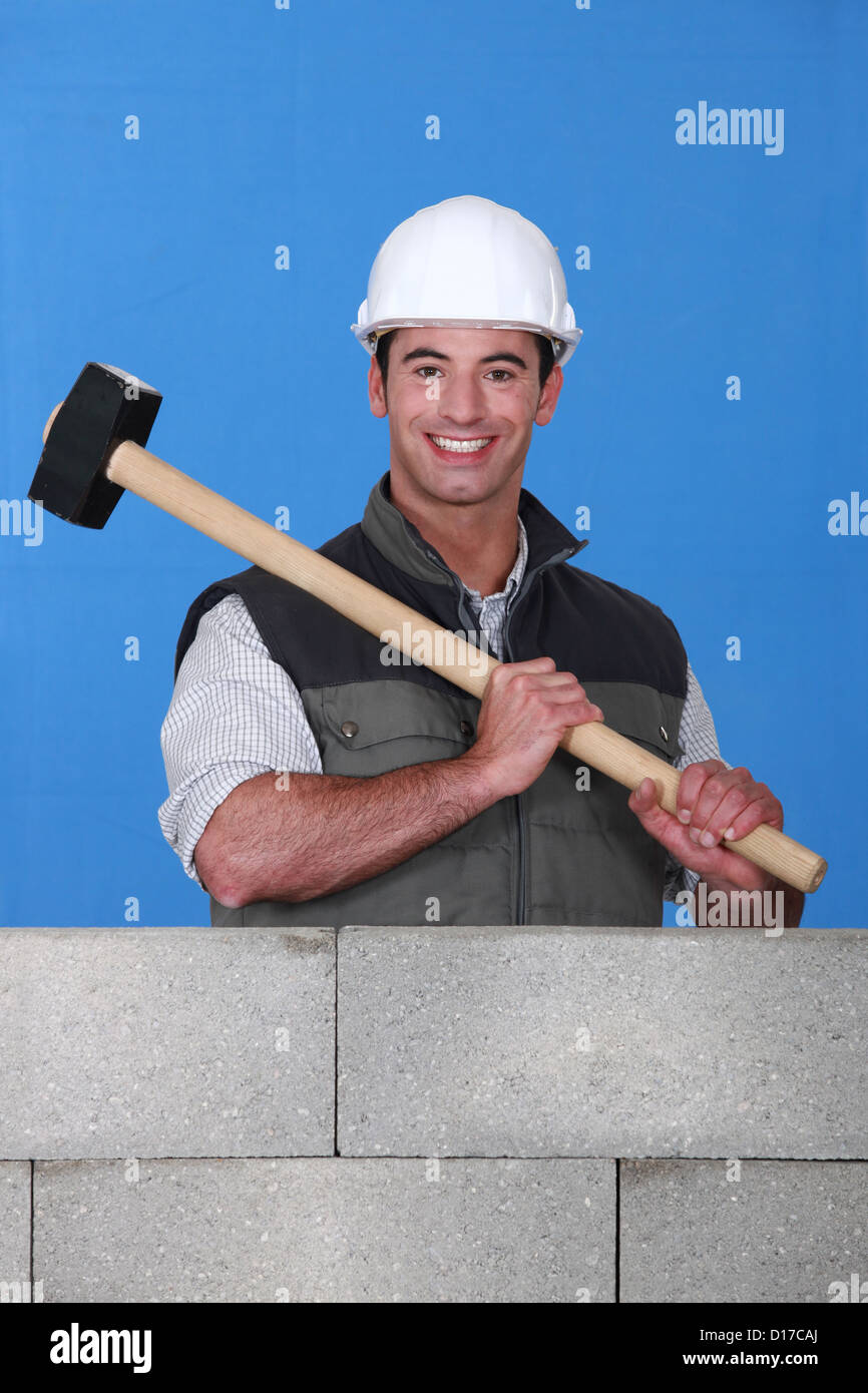 Man with hammer Stock Photo - Alamy