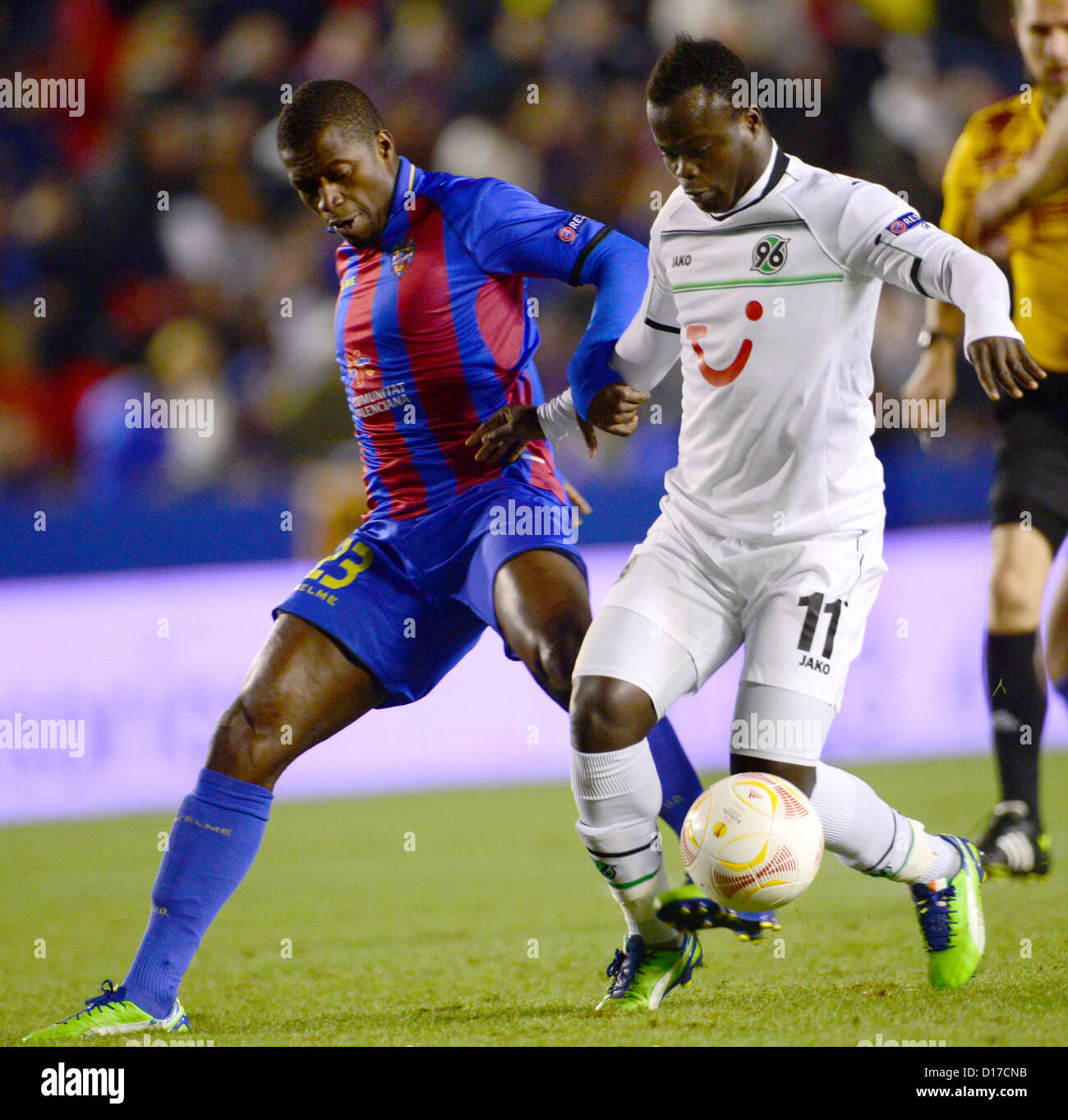 Levante's Papakouli Diop and Hanover's Didier Ya Konan vie for the ball ...