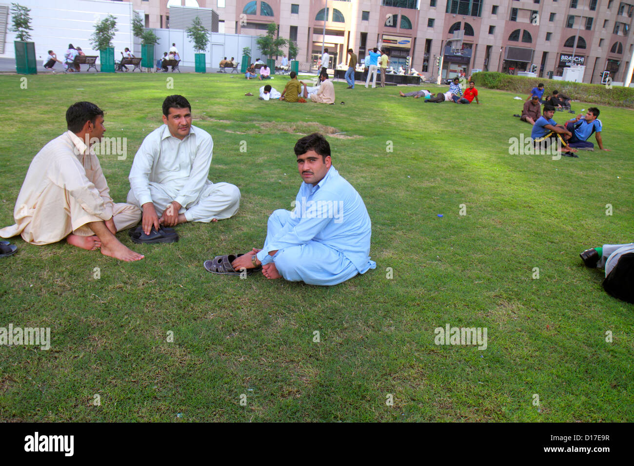 Arab man sitting on park hi-res stock photography and images - Alamy