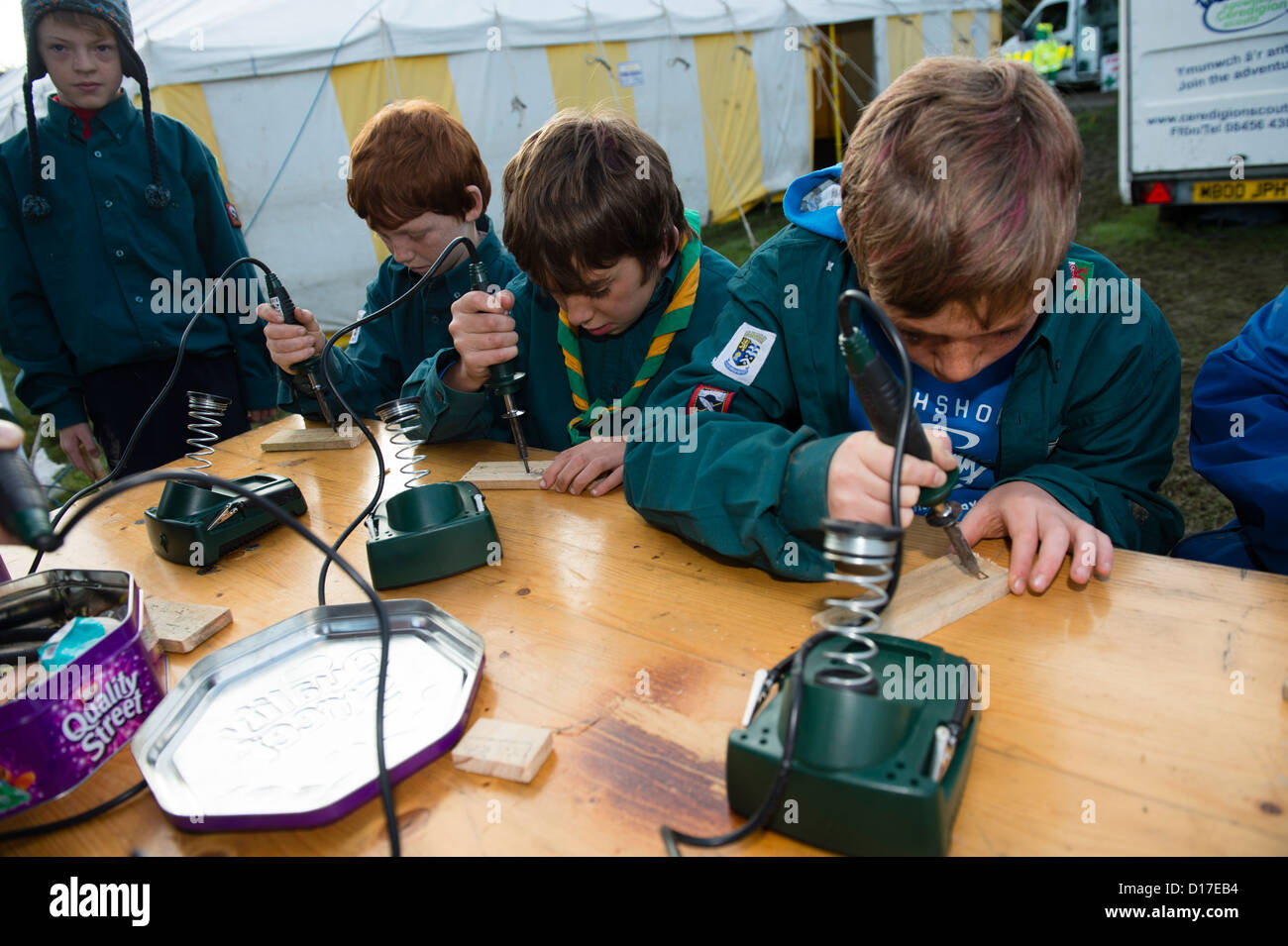 Scouts learning pyrography at a camp in Ceredigion, West Wales, UK ...