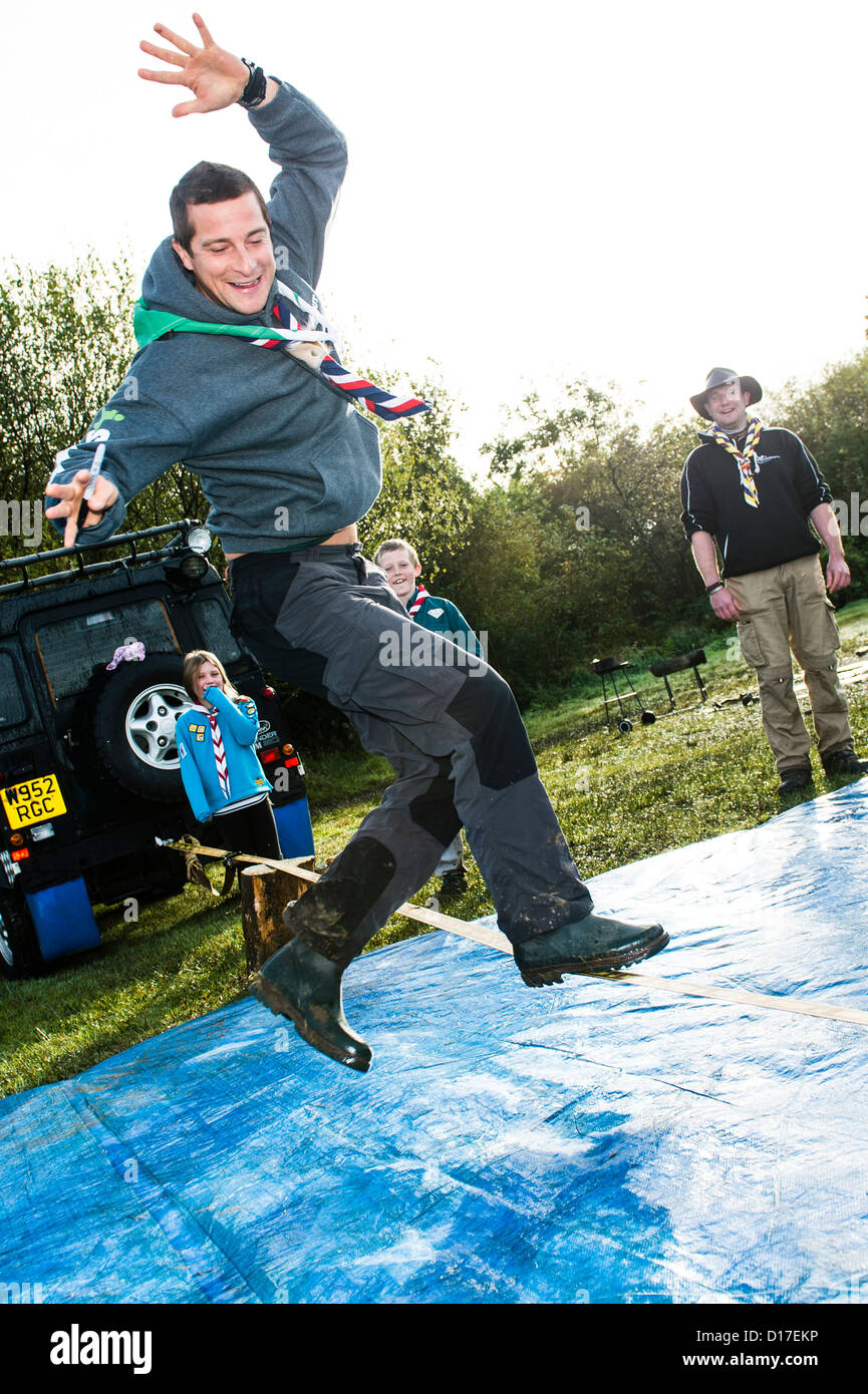 Chief Scout BEAR GRYLLS with welsh girl and boy scouts at a camp in ...