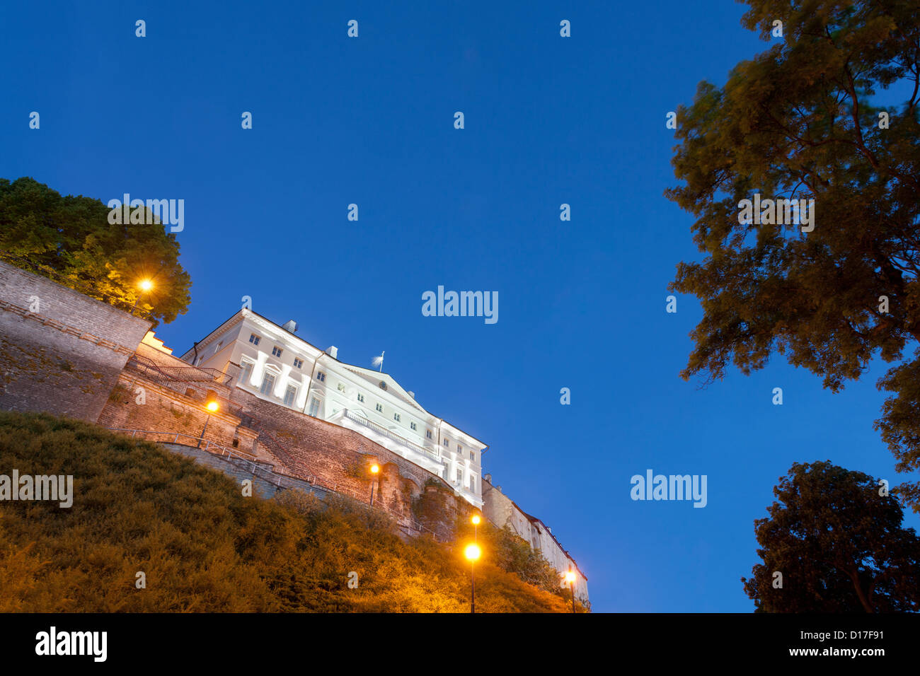 Building overlooking medieval city wall Stock Photo - Alamy