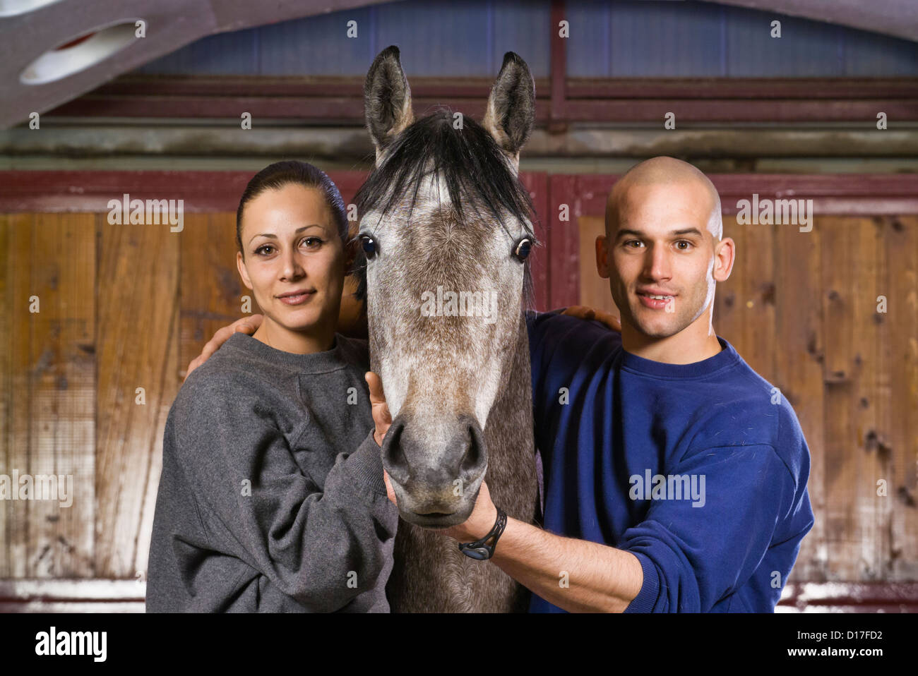 Italy, countryside, young couple with a horse Stock Photo - Alamy