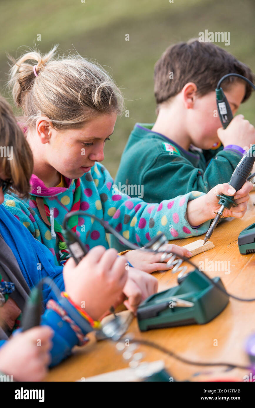Scouts learning pyrography at a camp in Ceredigion, West Wales, UK ...