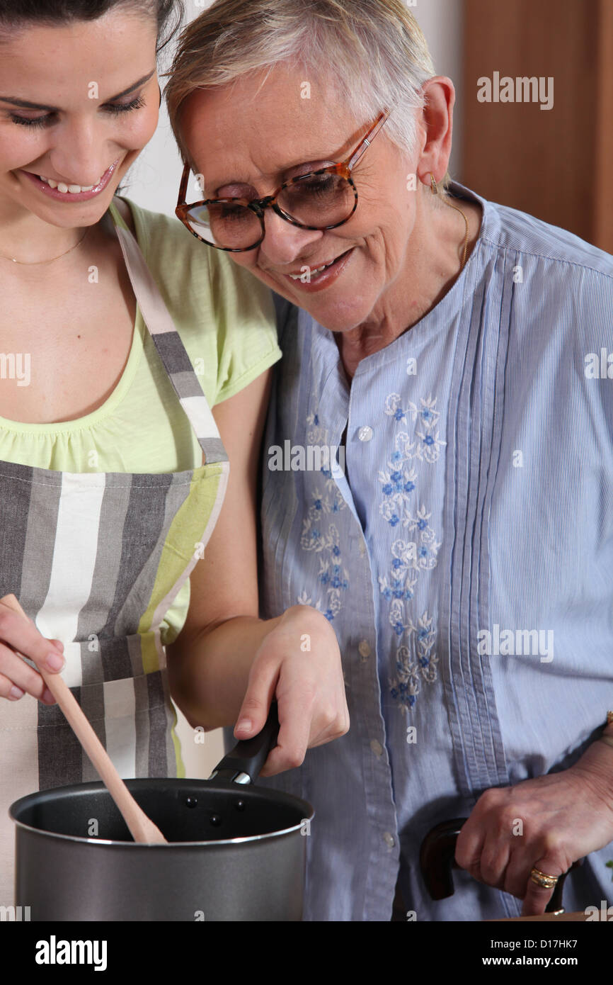 Help senior in the kitchen Stock Photo - Alamy