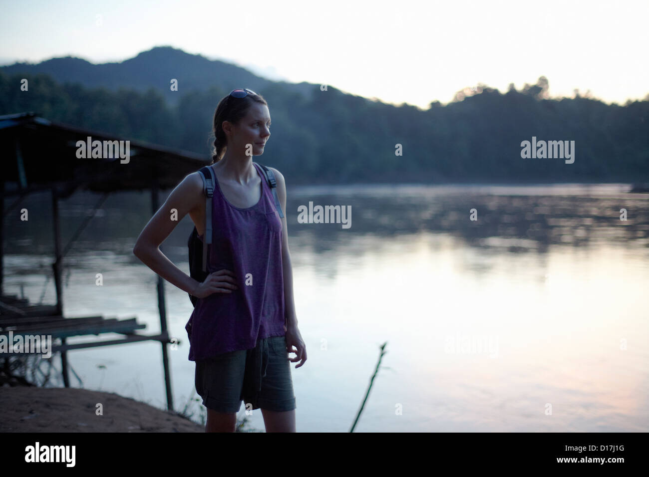 Woman walking by lake hi-res stock photography and images - Alamy