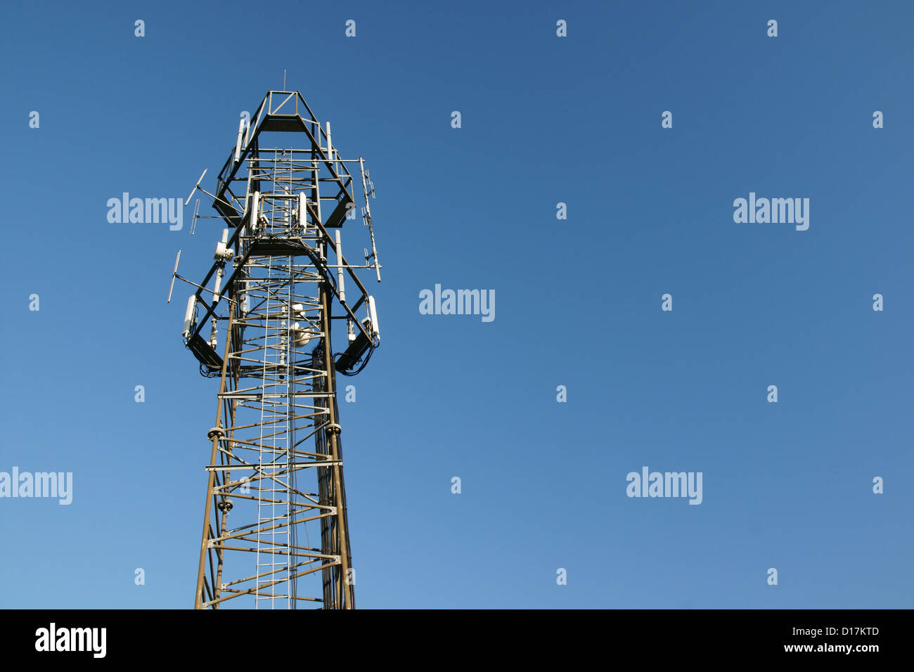 Telecommunications transmitter tower Stock Photo - Alamy