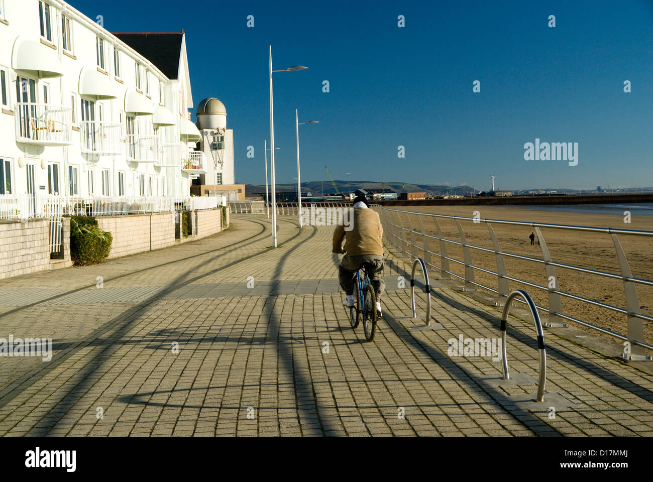 cyclist on swansea bay cycle path, marine walk, maritime quarter ...