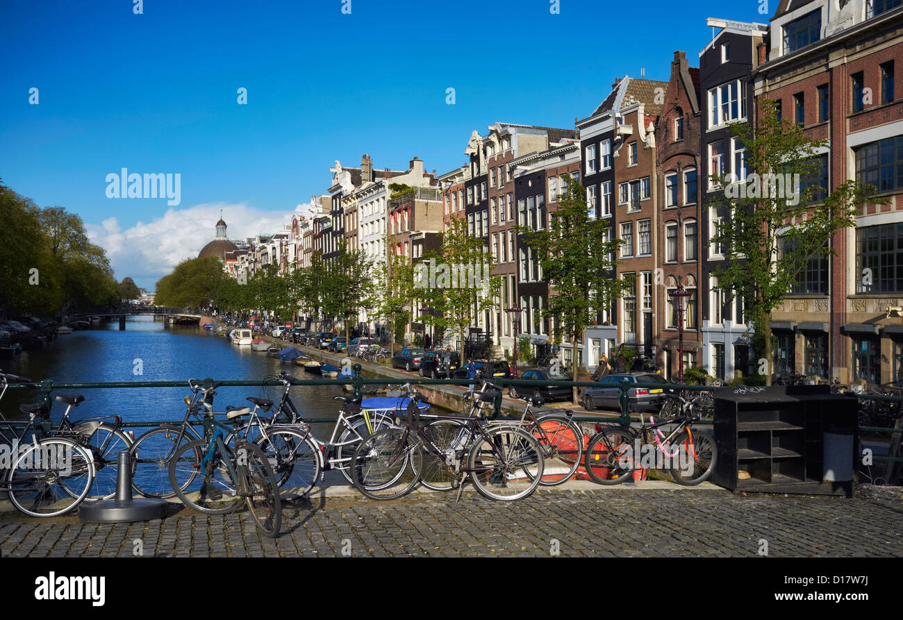 Holland, Amsterdam, view of one of the many canals and the facades of ...