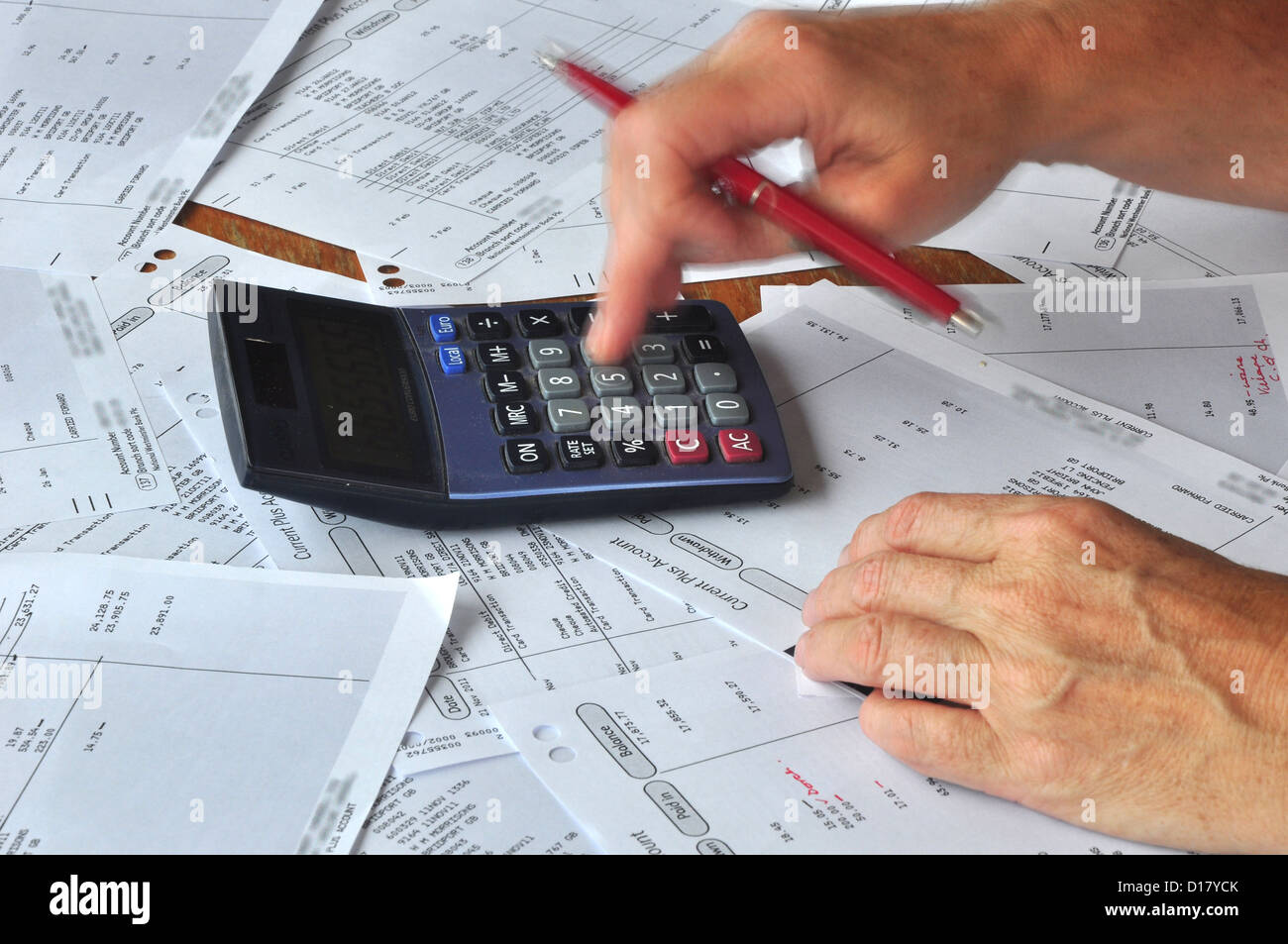 Checking the bank statement UK Stock Photo - Alamy