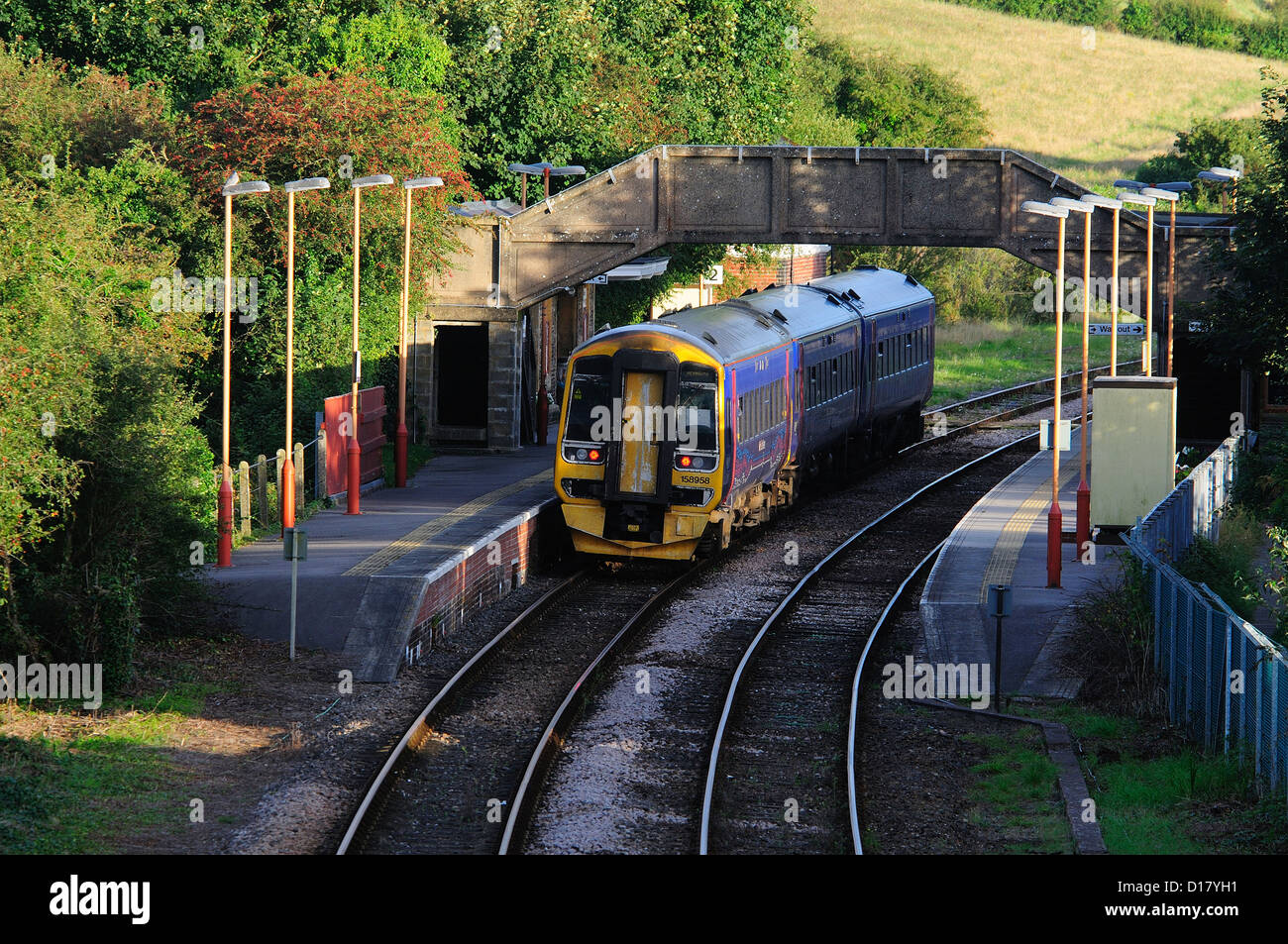 A train standing in the small rural station at Maiden Newton Dorset UK ...