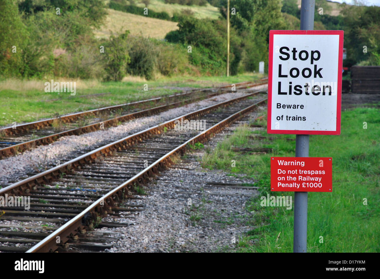 A railway warning sign to observe before crossing the track UK Stock ...
