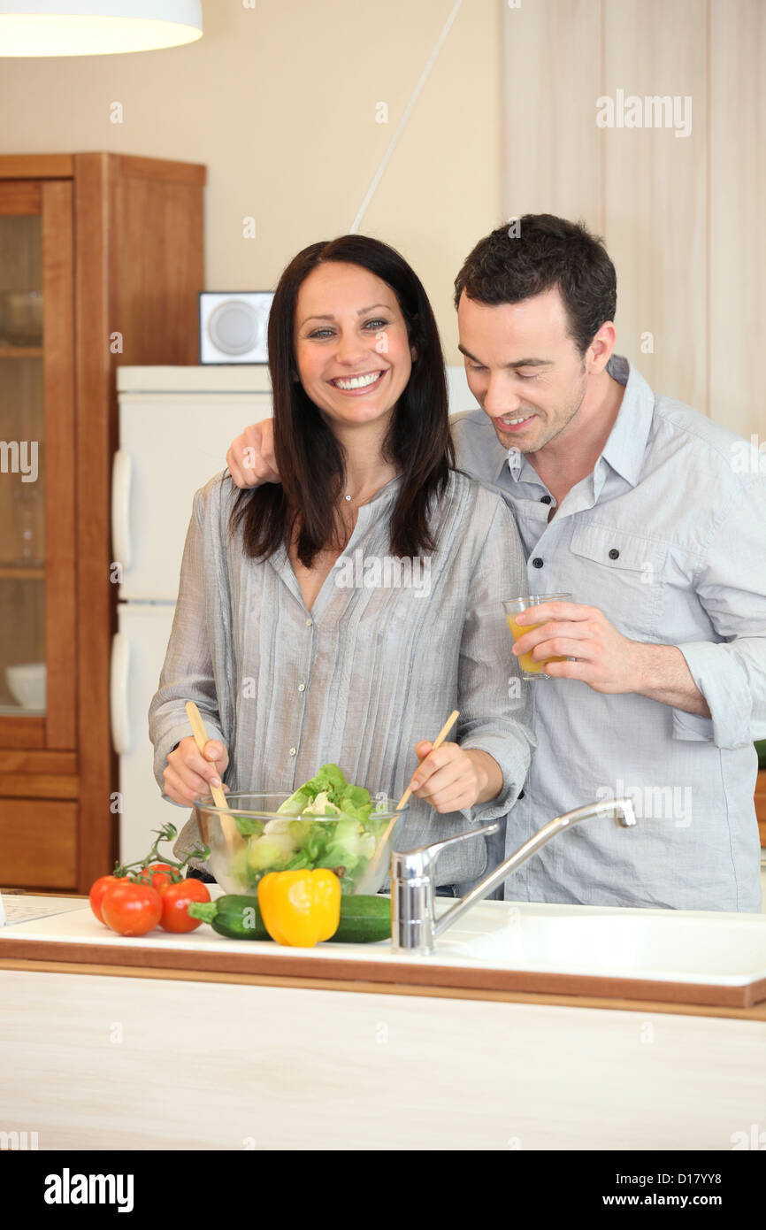 Couple in the kitchen Stock Photo - Alamy