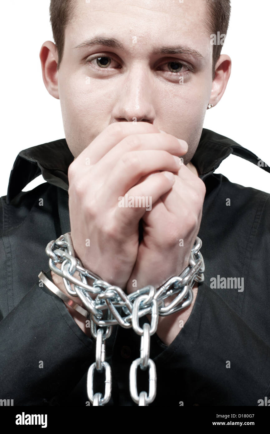 Man with a chained hands Stock Photo - Alamy