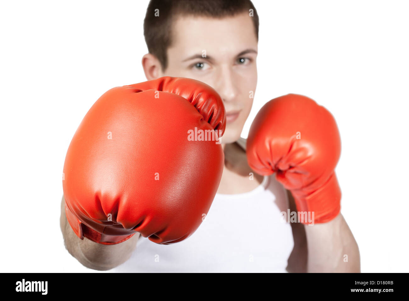 Young man with boxing glove Stock Photo - Alamy